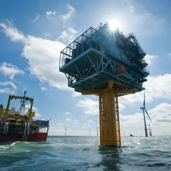 Side stone dumping vessel | Van Oord
